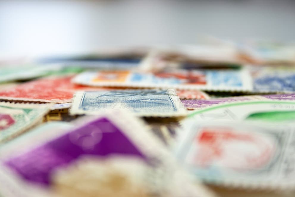 Closeup View on a Variety of Multi-colored Postage Stamps from ...