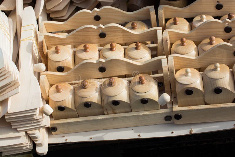 Closeup View of Wooden Objects in Boxes on a White Table Captured on a ...
