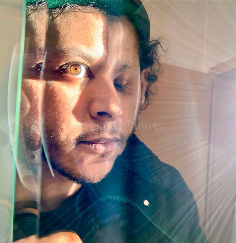 Closeup View of a Young Male Face Illustrated in Mirror Image Stock ...