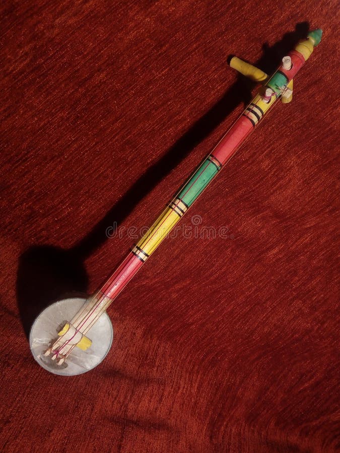 Closeup of a Vintage Moroccan Lute Instrument on a Red Surface Stock ...