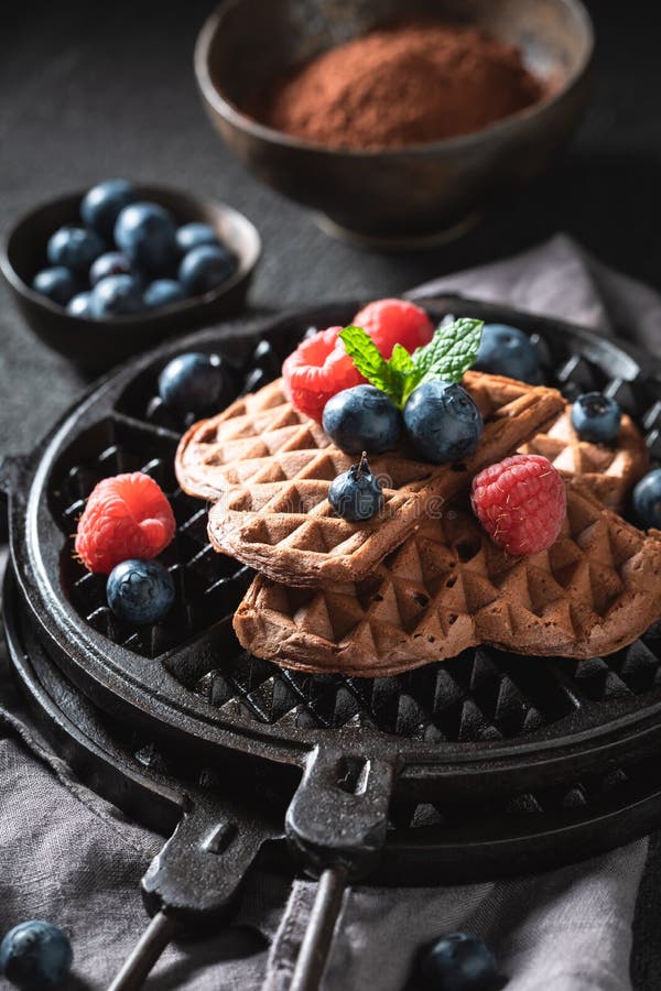 Waffles Made of Cocoa with Fresh Berries Stock Image - Image of ...