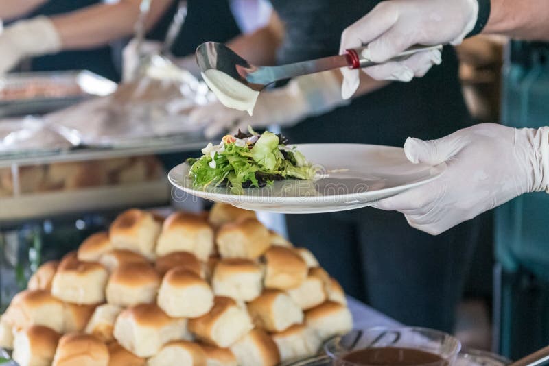 Closeup of Waiters Serving Food in a Restaurant Stock Image - Image of ...