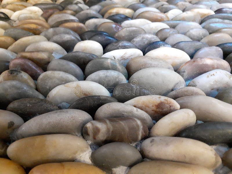 Closeup of a Wall of Rocks with Various Colors and Patterns. Stock ...