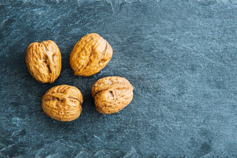 Closeup on Walnut on Stone Substrate Stock Photo - Image of slate, copy ...