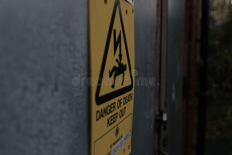Closeup of a Warning Sign of Danger Stock Image - Image of stay, yellow ...