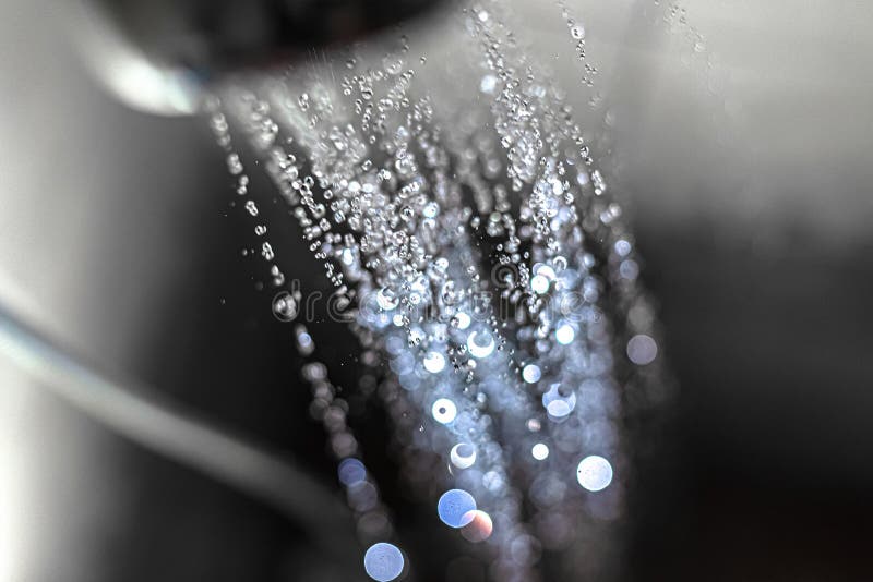 Closeup of Water Drops Running from the Shower Head in the Bathroom ...