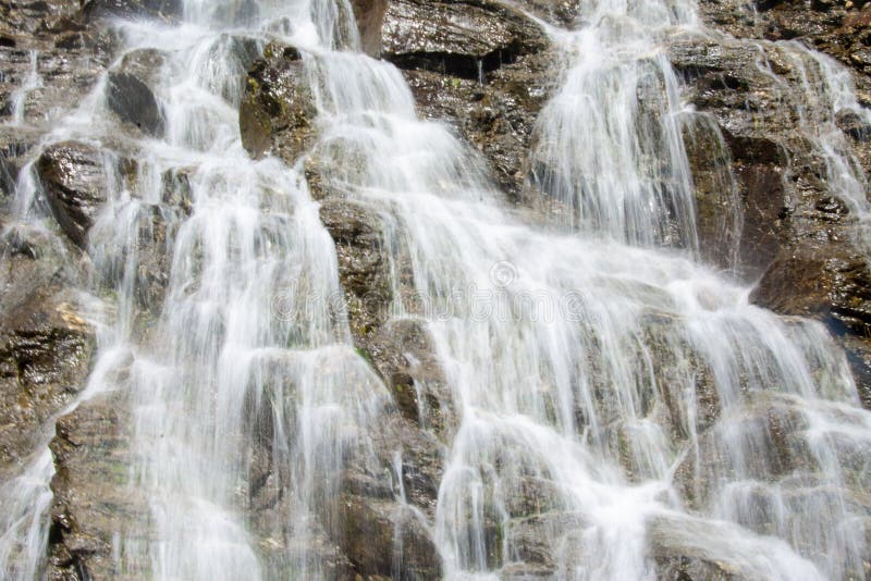 Closeup of Water Falling in a Cascade on the Rocks Stock Photo - Image ...