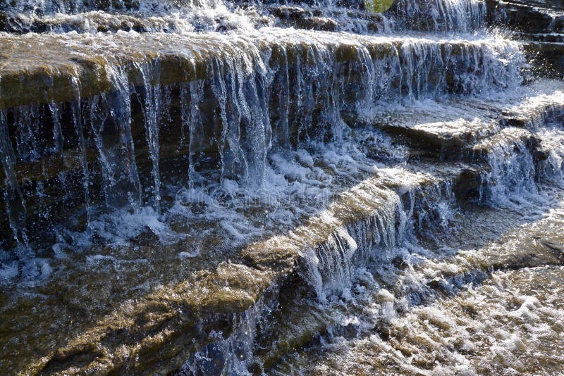 Closeup of Water Flowing Down Limestone Rock Layers at Healey Falls ...