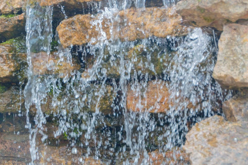 Closeup of Water Running through Layered Rocks. Stock Image - Image of ...