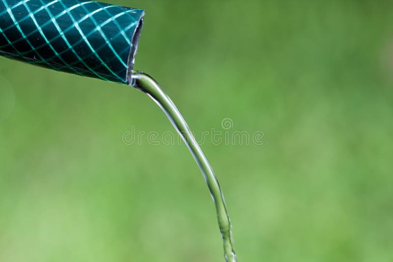 Closeup Of Water Trickling From Garden Hose Stock Photo - Image: 15275700