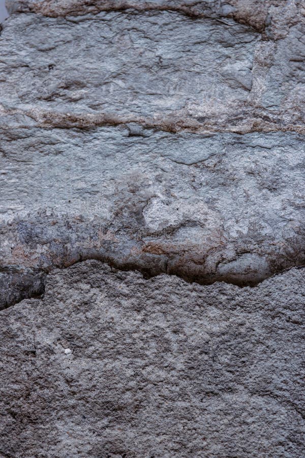 Closeup of a Weathered Bricks Stone Wall Cracks and Patina. Rough ...