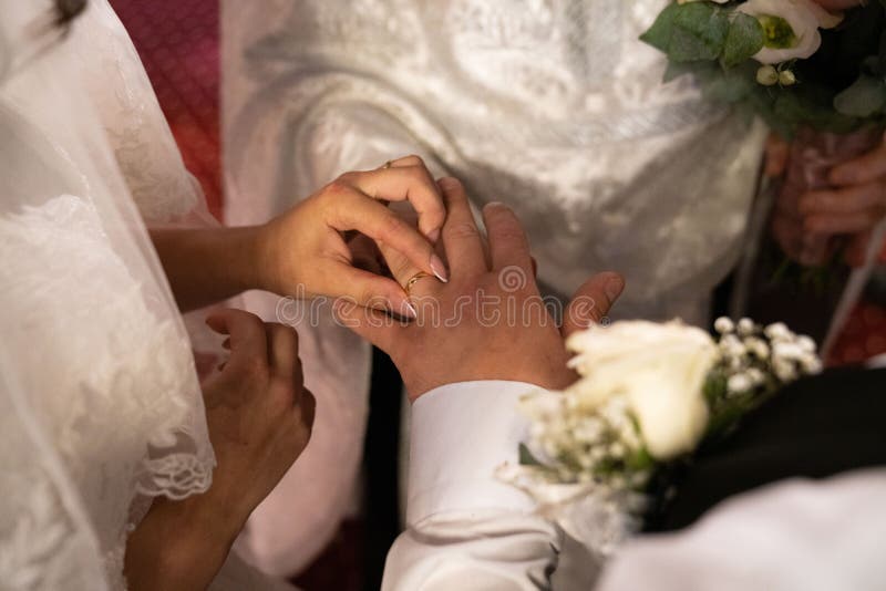 Closeup of Wedding Hands of a Bride and a Groom Stock Image - Image of ...