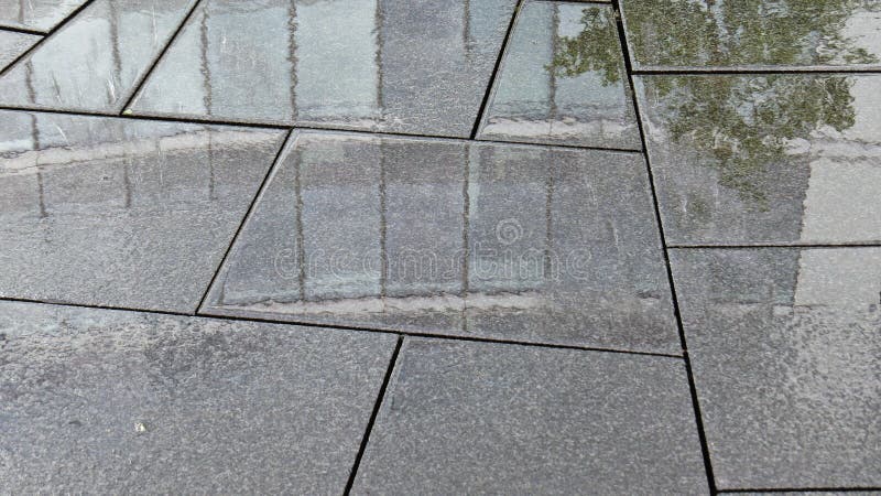Closeup of Wet City Stone Sidewalk Pavement Floor in Rain Reflection ...