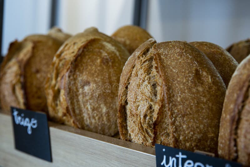 Stacked Loaves of Bread on Shelf in Bakery, Staple Food Stock Photo ...