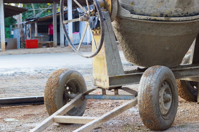 Closeup the Wheels of Cement Mixer on the Construction Site, Horizontal ...