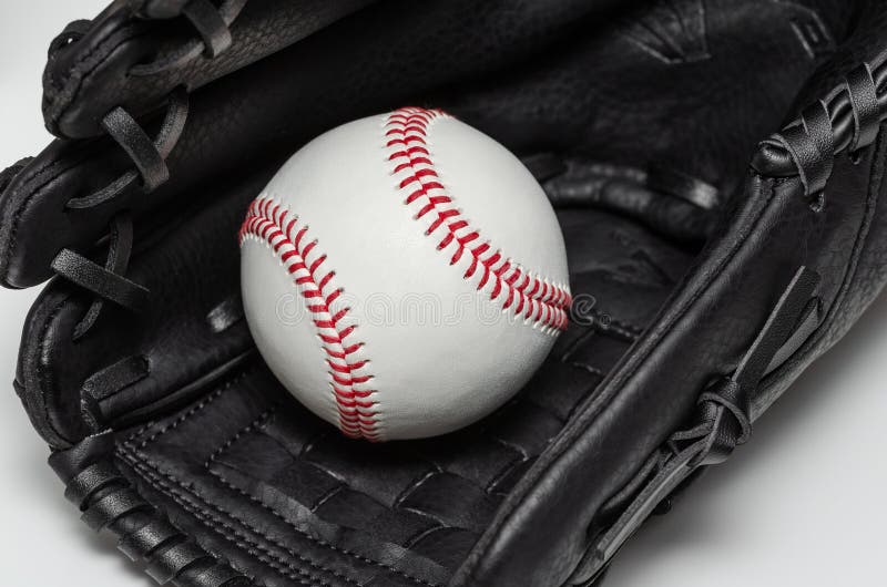 Closeup of a White Baseball Ball Inside Baseball Glove Stock ...
