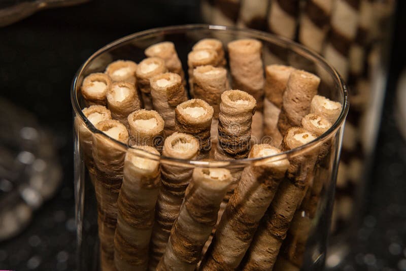 Closeup of White Chocolate Wafer Rolls in Glass Flask Stock Image ...
