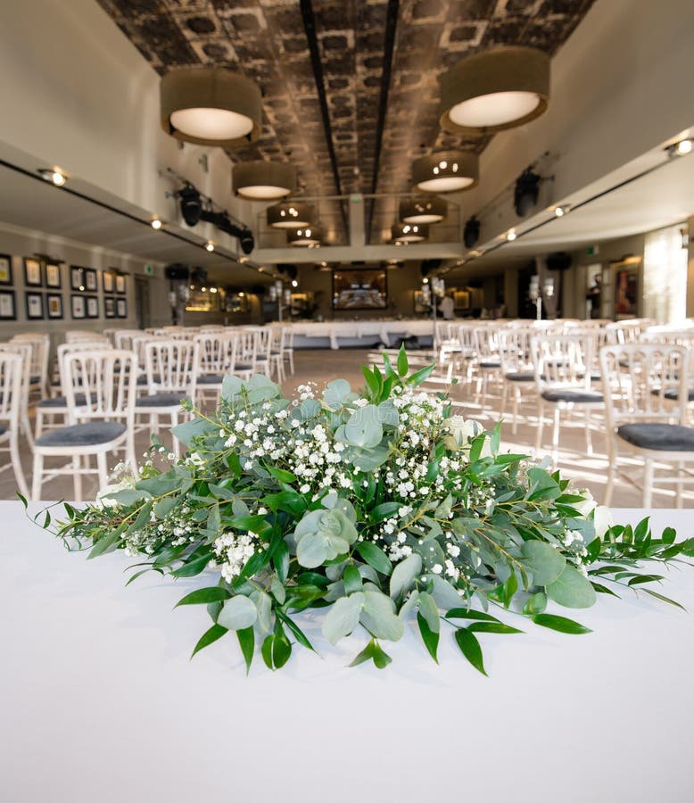 Closeup of the White Flowers on a Table in an Empty Wedding Venue Stock ...