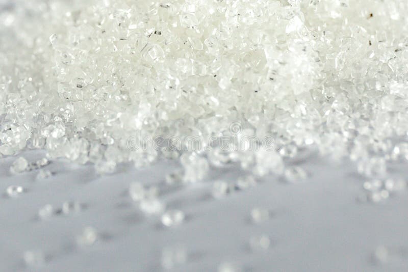 Closeup of White Granulated Sugar on Isolated White Background. Stock ...