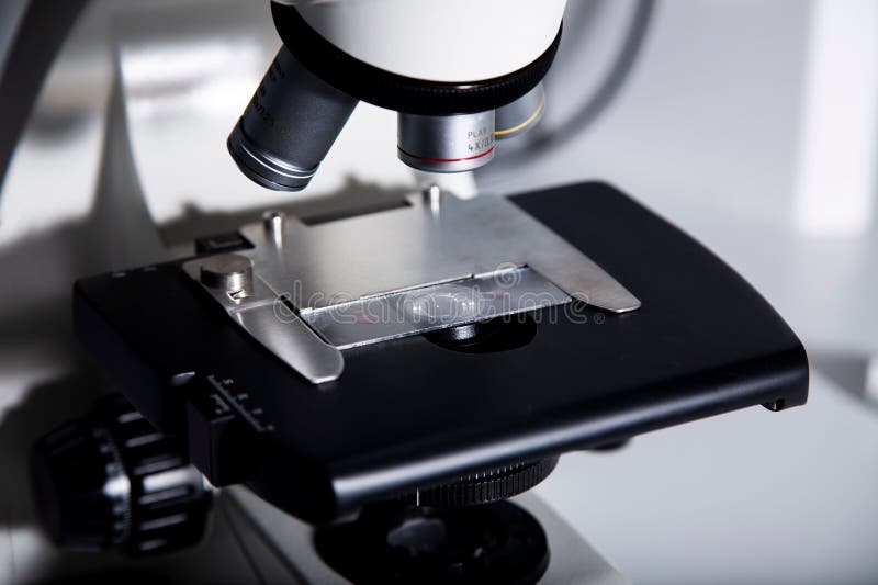Closeup of a White Microscope in a Laboratory Setting Stock Photo ...
