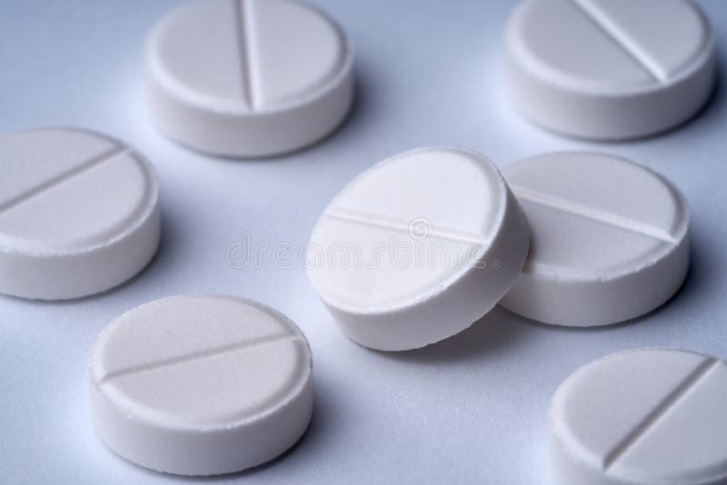 Closeup of White Tablets on a White Background with Texture Stock Photo ...