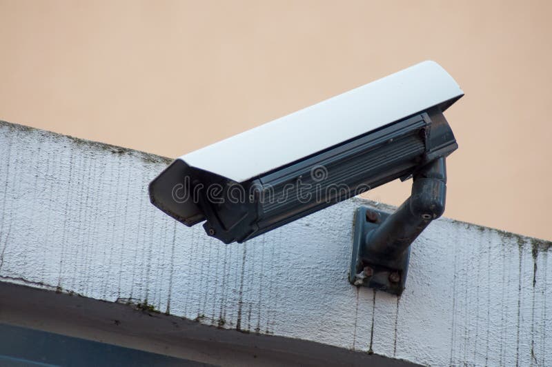 White Security Camera of Security on Urban Background Stock Photo ...