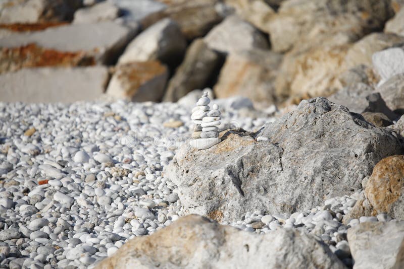 Closeup of White Stones on Top of Each Other on a Rock Under the ...