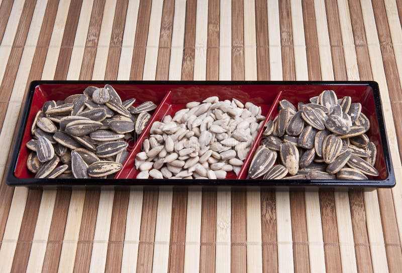 Closeup Whole and Dehulled Sunflower Seeds Stock Image - Image of ...