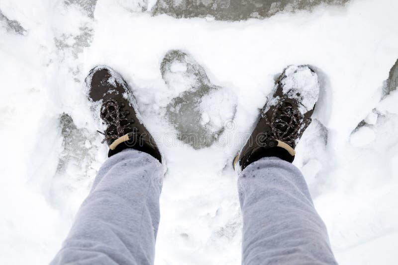 Close-up of Winter Boots in the Snow Stock Photo - Image of boot, feet ...