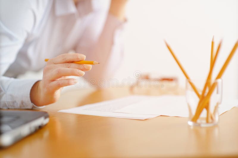 Closeup of a Woman Freelancer Works in the Office at the Table. Stock ...