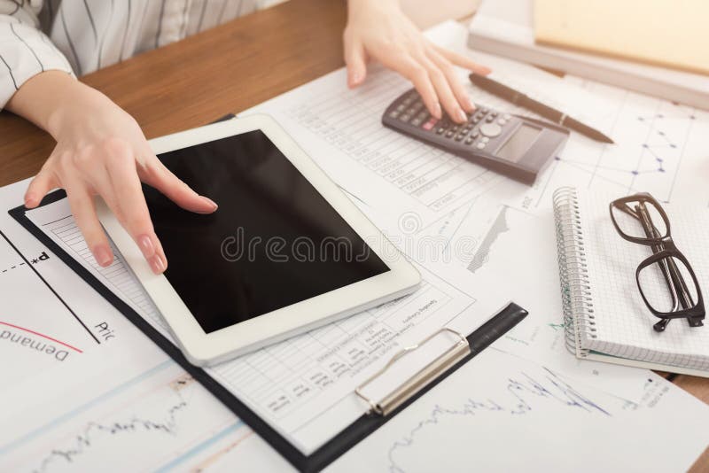 Closeup of Woman Hands Counting on Calculator and Using Tablet Stock ...