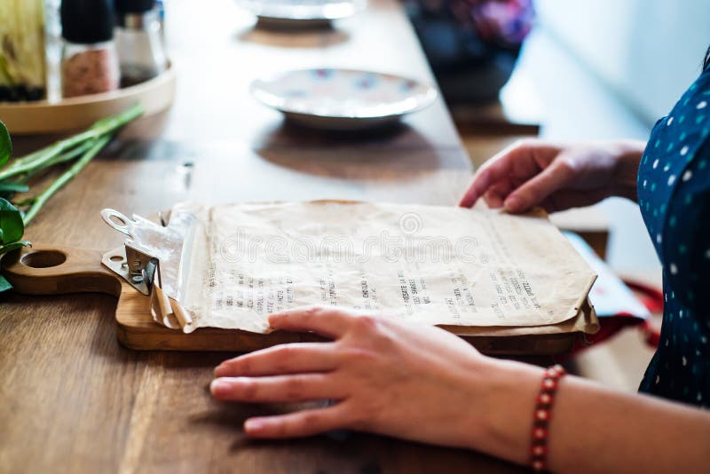 Closeup of Woman Hands Holding Menu Stock Image - Image of luxury ...
