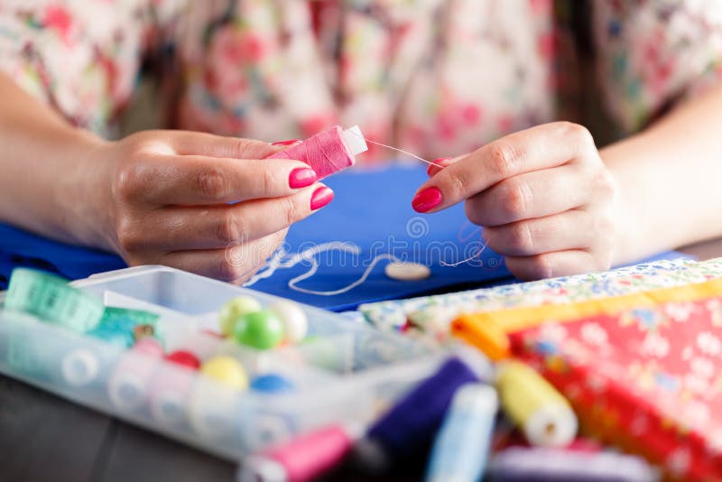 Closeup of Woman Hands Sewing a Button. Stock Photo - Image of sewn ...