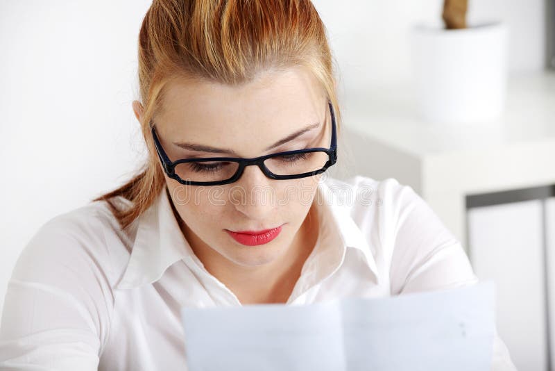 Closeup on Woman Reading Files. Stock Image - Image of looking, career ...