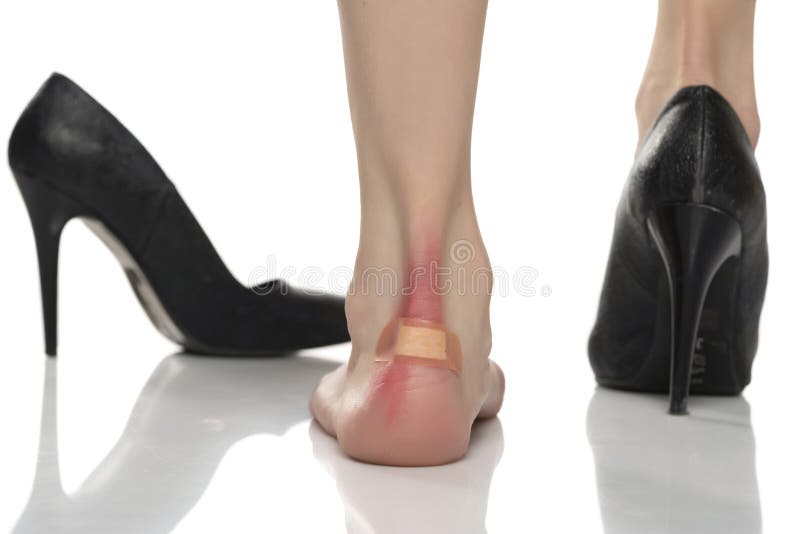 Closeup of a Woman`s Heel with a Blister Plaster on White Stock Photo ...
