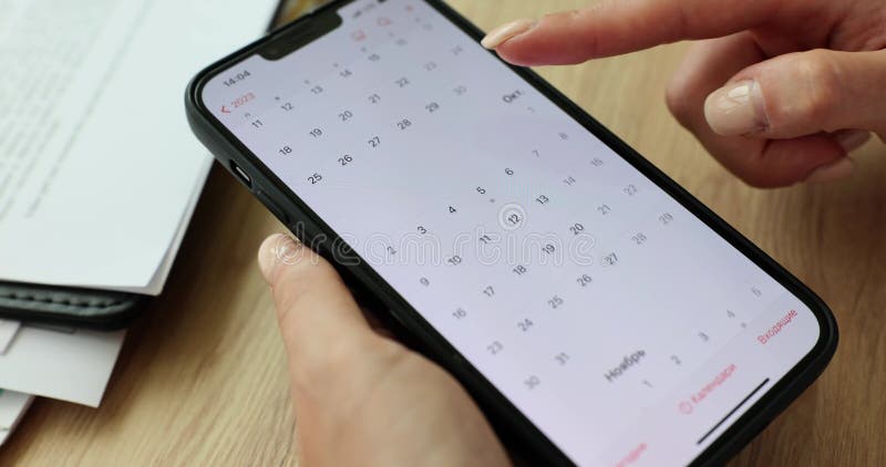 Closeup of Woman Using Calendar Application on Mobile Device Stock ...