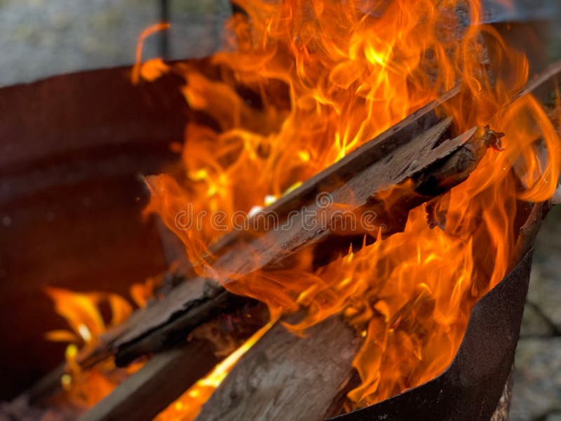 Closeup of a Wood Burning in Fire Flames in a Rusty Metallic Pot Stock ...