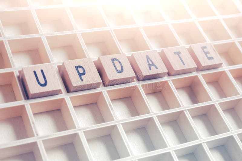 Closeup of the Word Update Formed by Wooden Blocks in a Typecase Stock ...