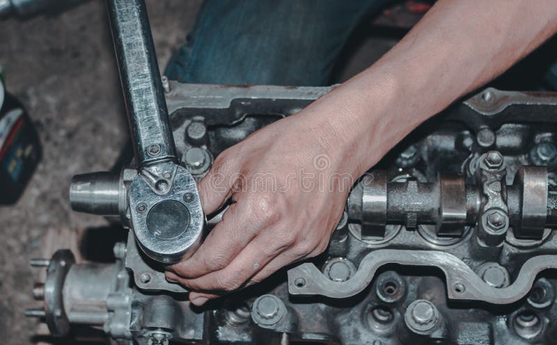 Closeup of a Worker Fixing an Internal Combustion Engine Stock Image ...