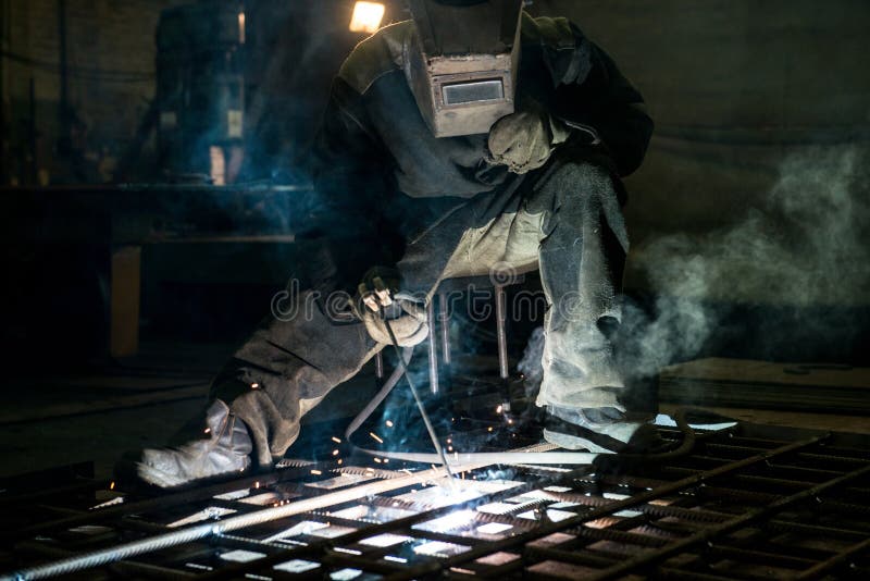 Closeup Worker in a Mask Doing the Welding in a Workshop Stock Photo ...