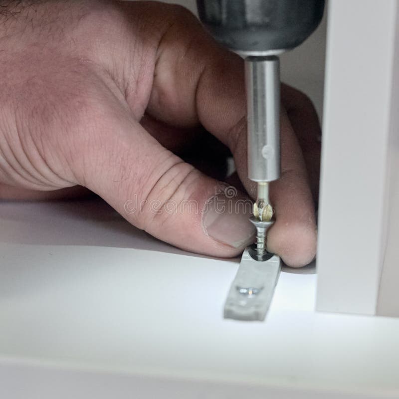 Carpenter fixing henge stock photo. Image of engineer - 116280234