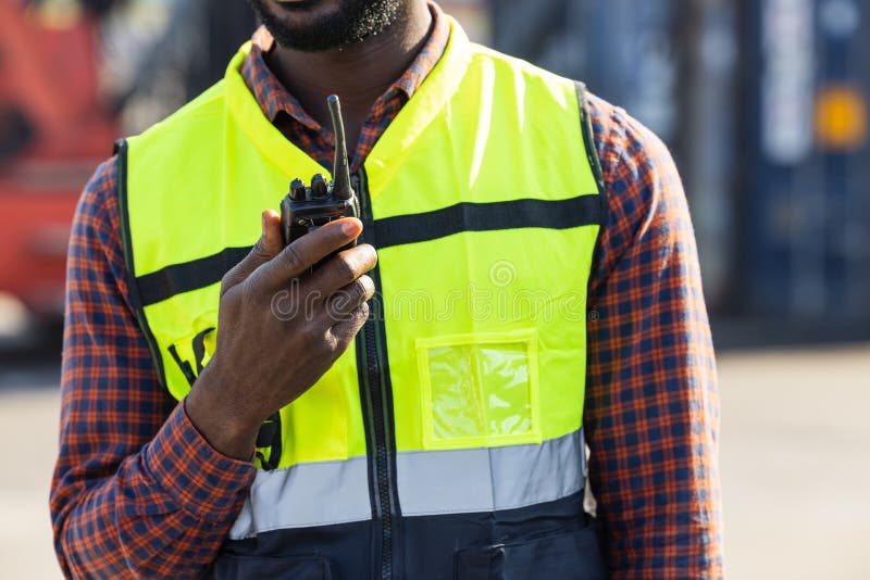 Closeup Worker Using Ham Radio for Operation Control in Cargo Port ...