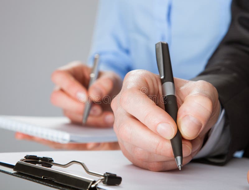 Closeup of Working Business Team Taking Notes Stock Photo - Image of ...