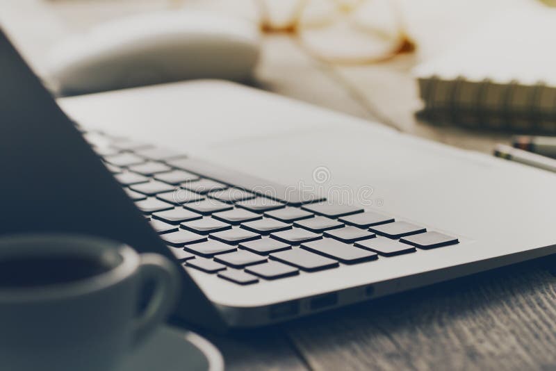 Closeup of Workspace with Modern Creative Laptop, Cup of Coffee Stock ...