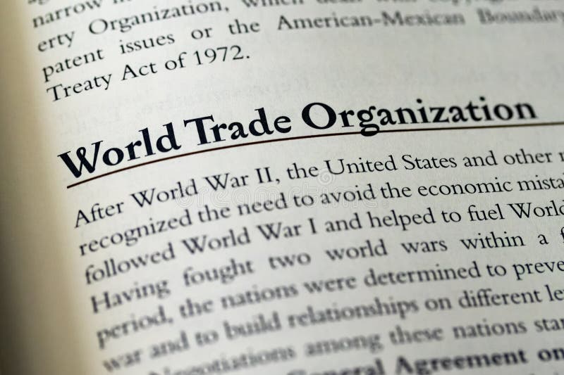 Closeup of the World Trade Organization, Printed in Textbook on White ...