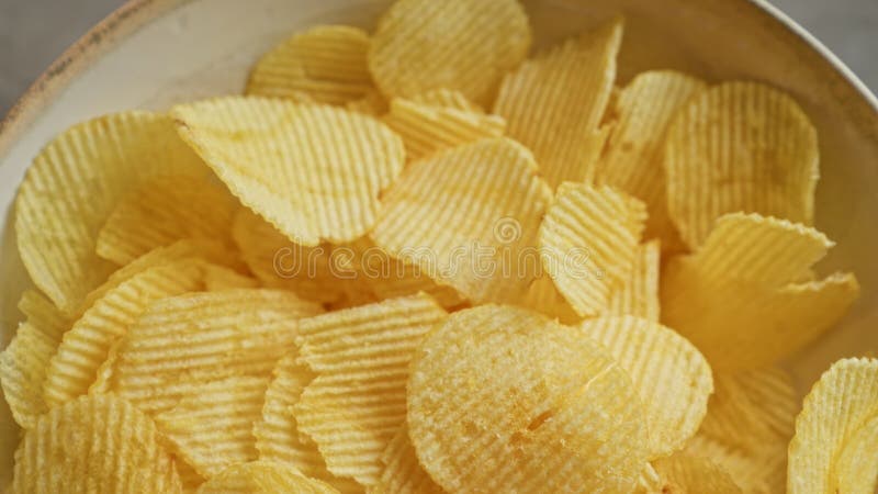 Closeup of Yellow Crispy Potato Chips in a Bowl, Showcasing Their ...