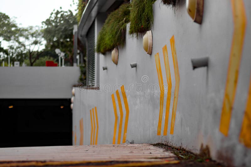 Closeup of the Yellow-painted Direction Indicator Arrows on the Wall ...