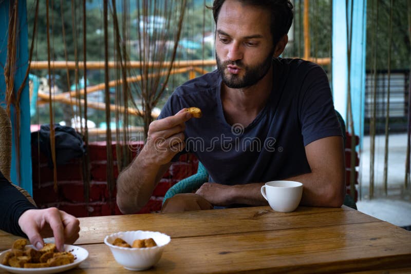 Closeup of a Young Caucasian Man Tasting a Snack in a Restaurant Stock ...