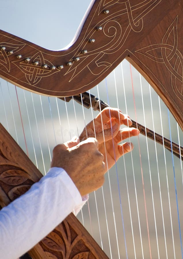 Closeup of a Young Lady Playing a Harp Stock Photo - Image of harmonic ...