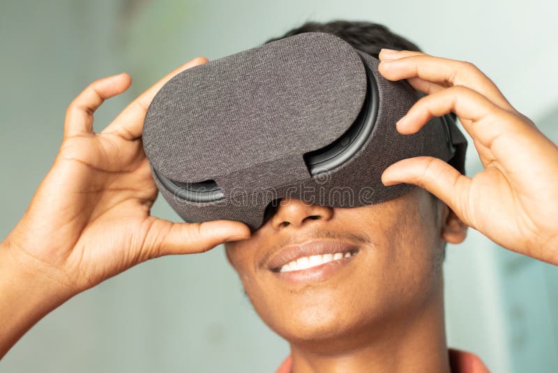 Closeup of a Young Man Experiencing Virtual Reality through a VR ...